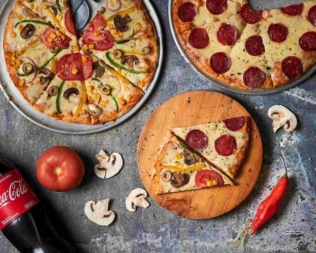 Eli Pizza a domicilio en Quito | Menú y precios | Uber Eats